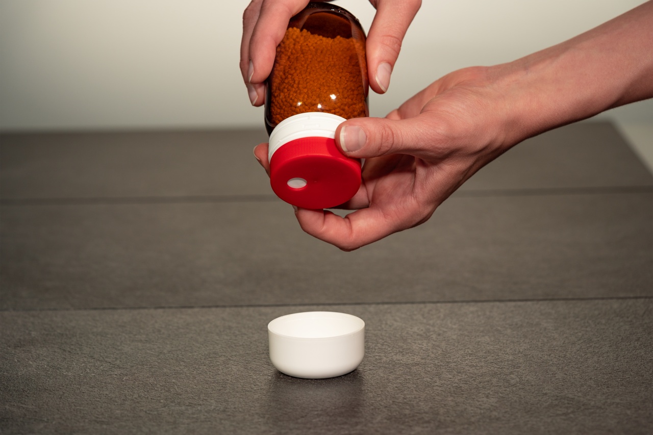 PACKSYS granulate dispenser: dispensing closure for granulate